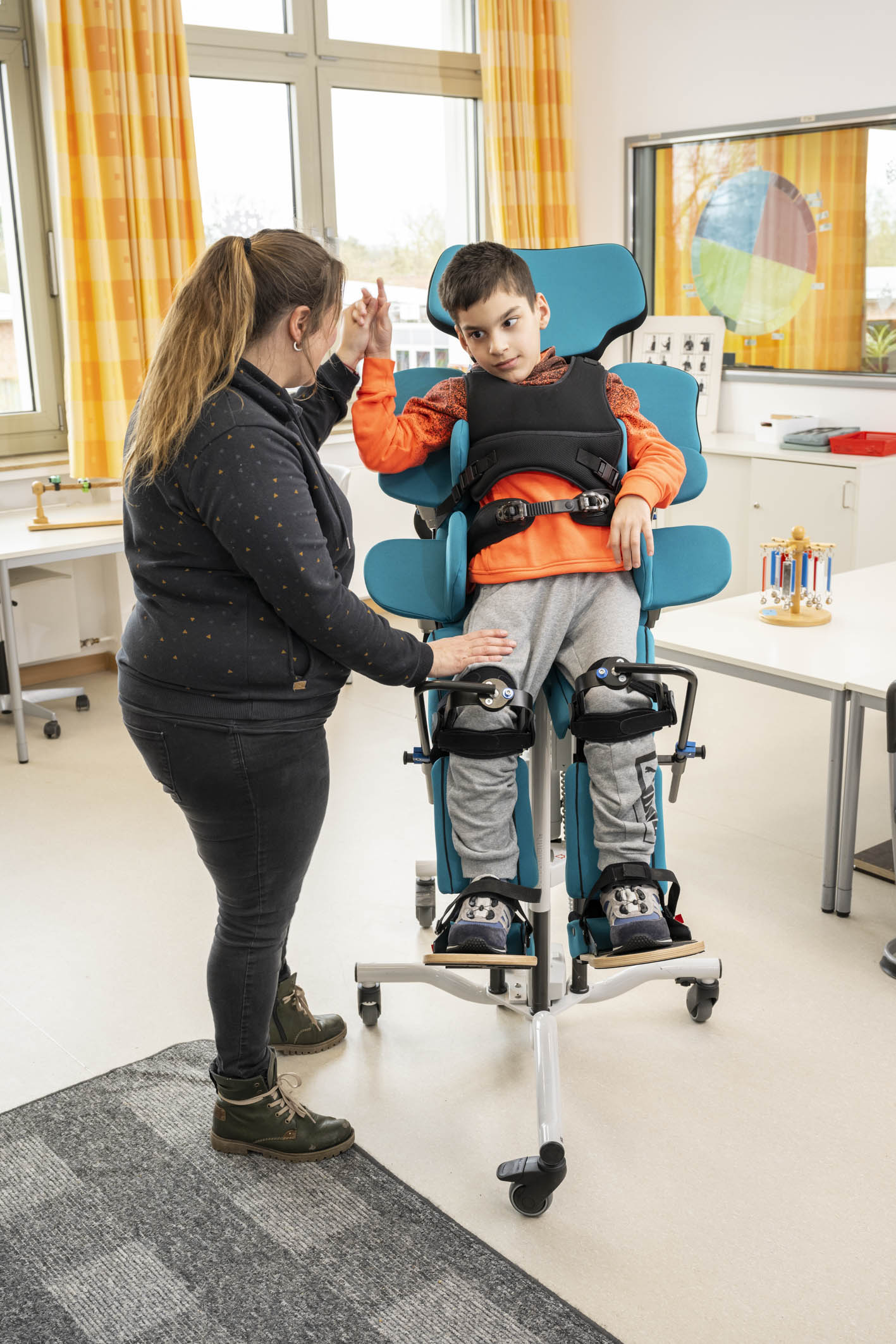 Till ståtræner – fleksibel støtte og ståfunktion